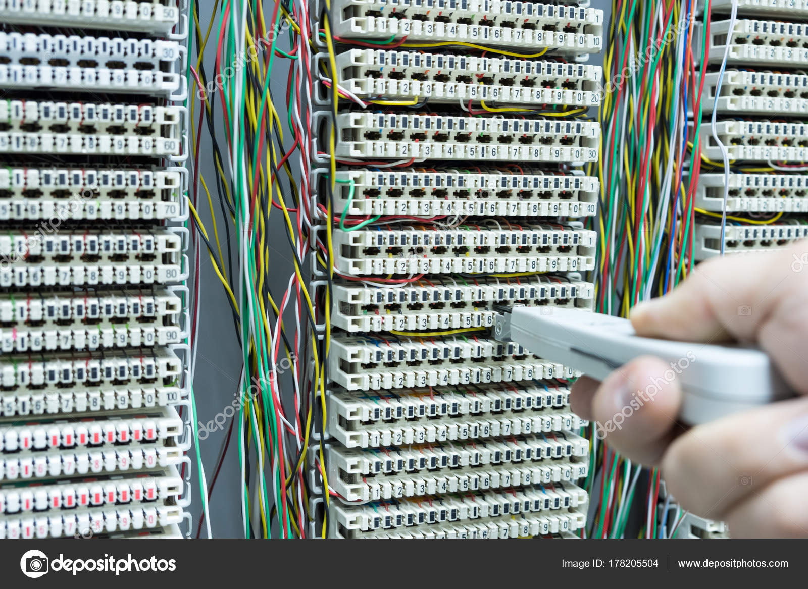 Operator installing telephone switchboard — Stock Photo © mehmetbaysan ...