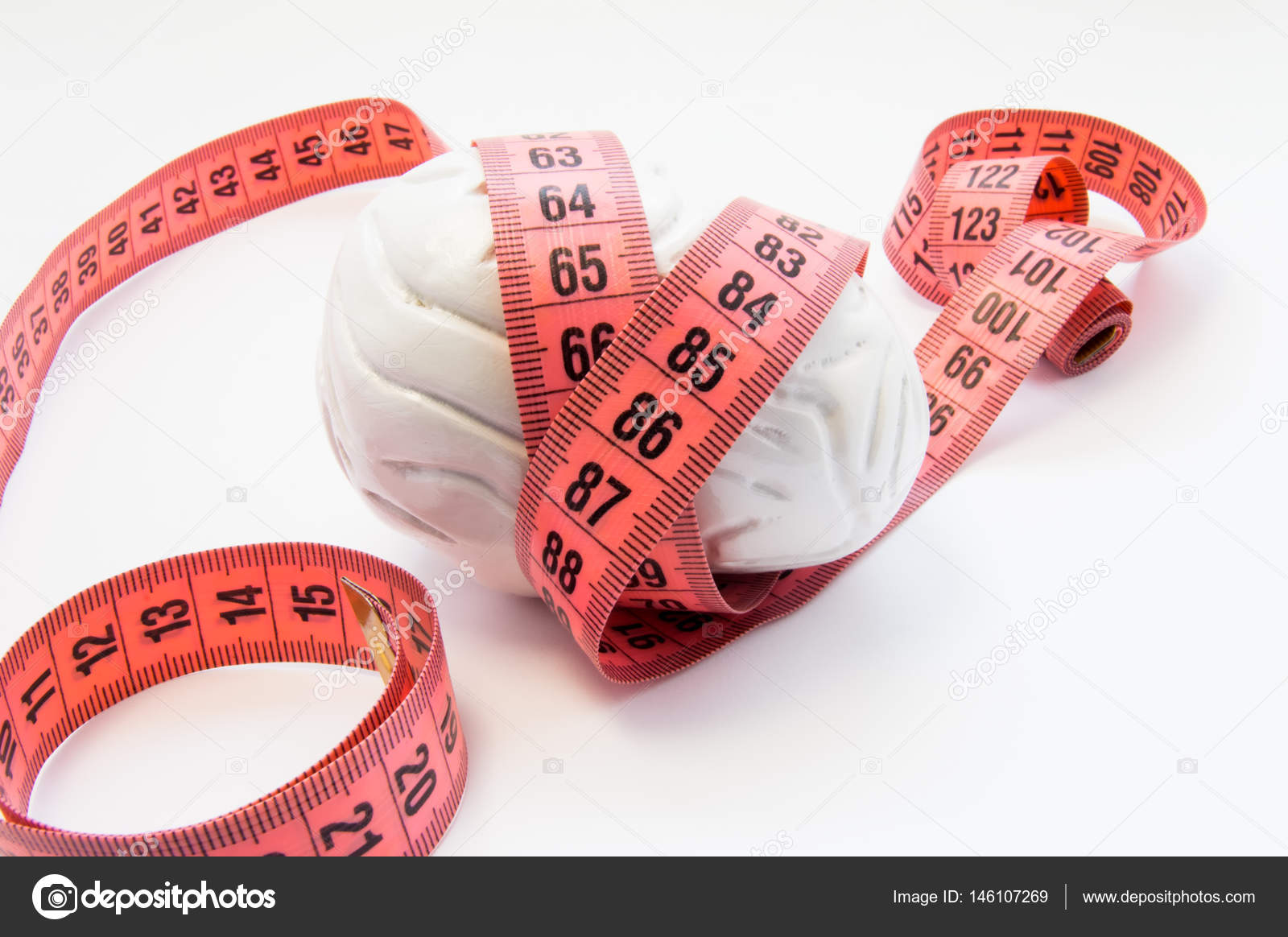 Anatomical shape of human brain wrapped measuring tape. Concept photo ...