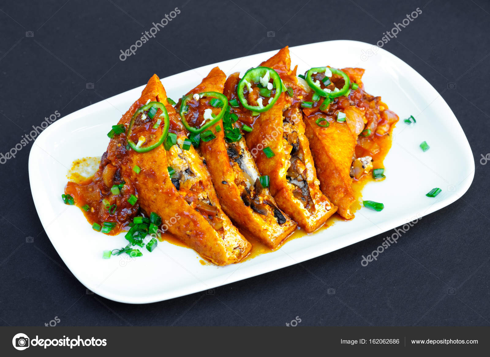 Crispy Halloumi cheese sticks Fries with Chili sauce for dipping Stock ...