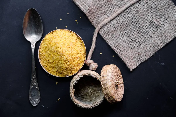 Seeds bulgur on dark background with copy space. Healthy food ...
