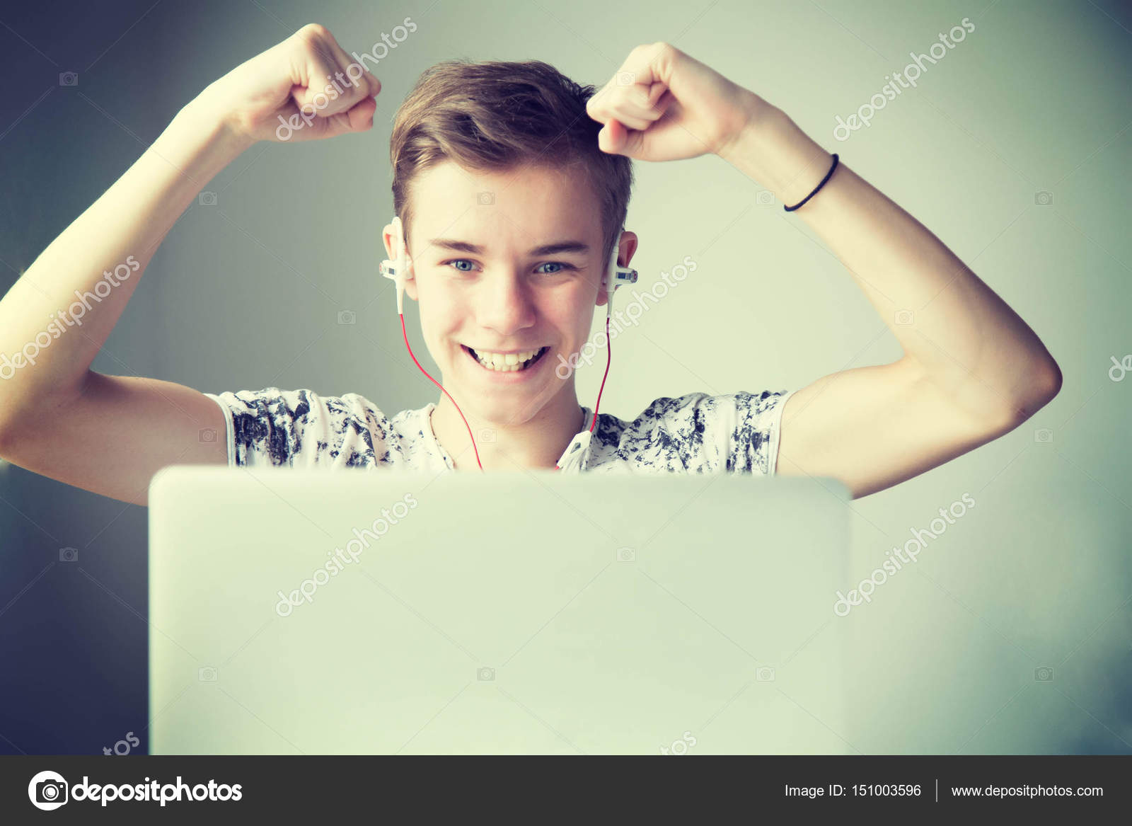 Young man playing game at home. Shouting crazy guy has won the hardest ...