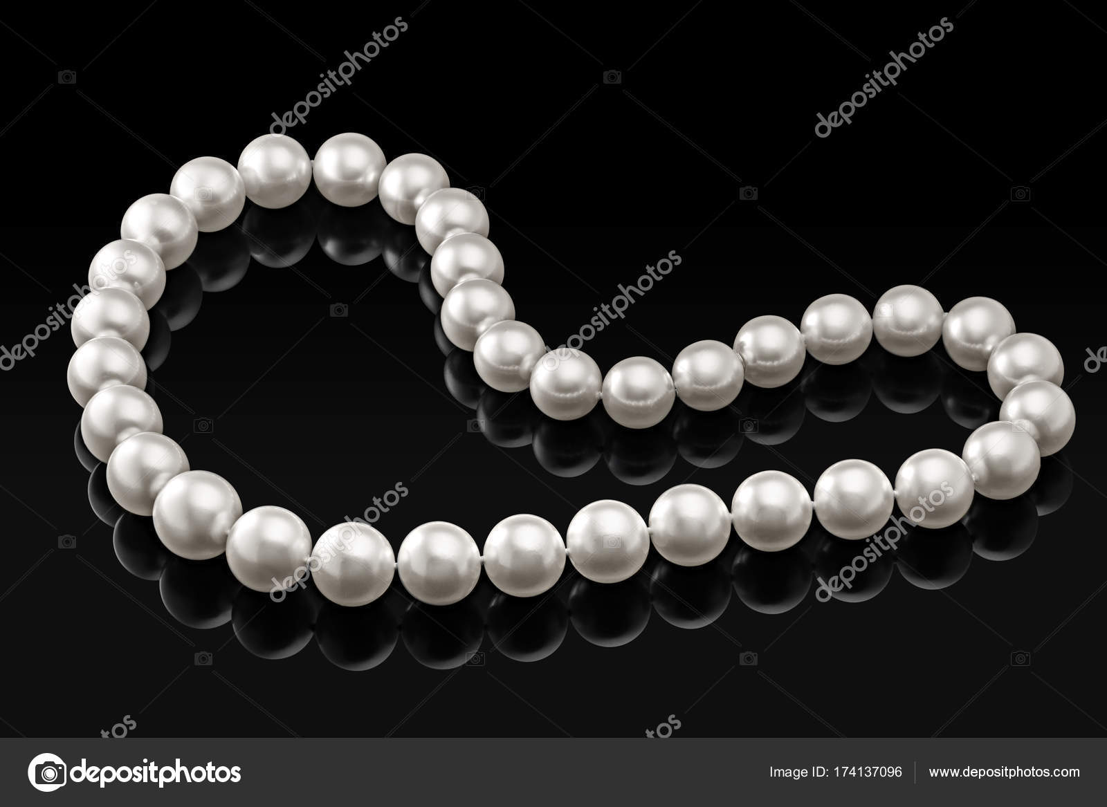 Luxury white pearl necklace on a black background with glossy ...