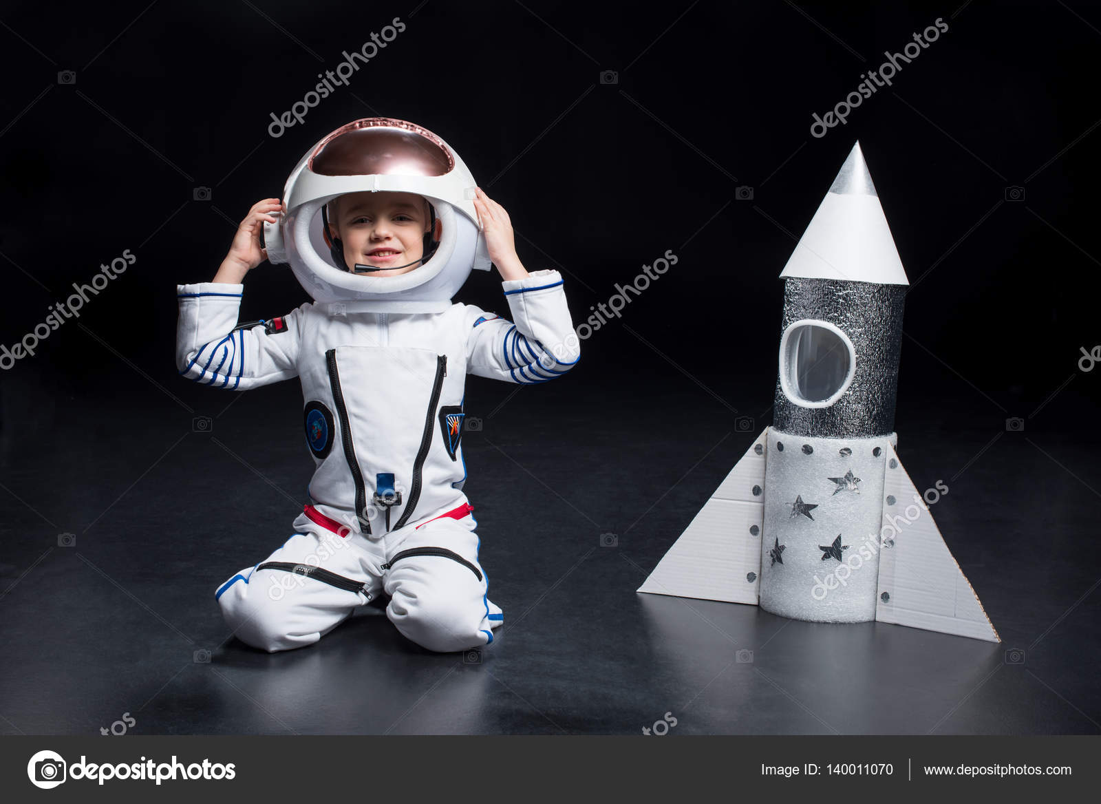 Boy in astronaut costume Stock Photo by ©NatashaFedorova 140011070