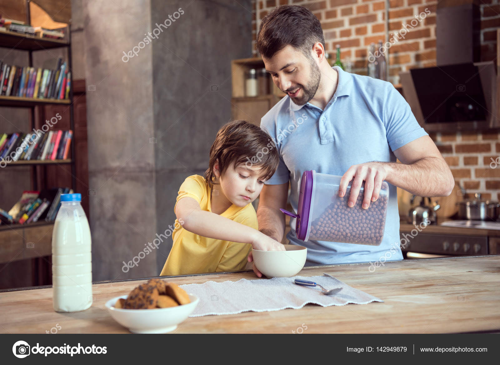 Father and son having breakfast — Stock Photo © NatashaFedorova #142949879
