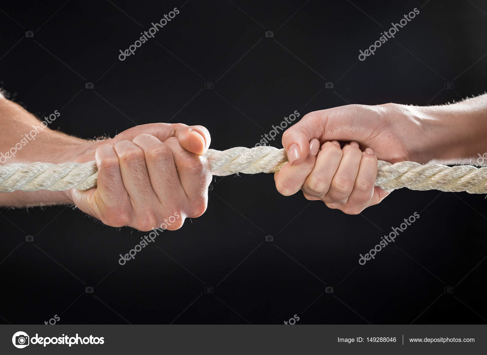 Man and woman pulling rope — Stock Photo © NatashaFedorova #149288046
