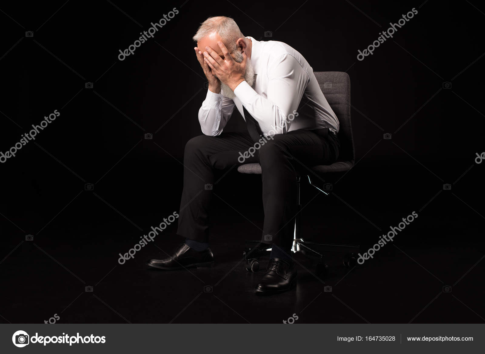 Man holding face in hands — Stock Photo © NatashaFedorova #164735028