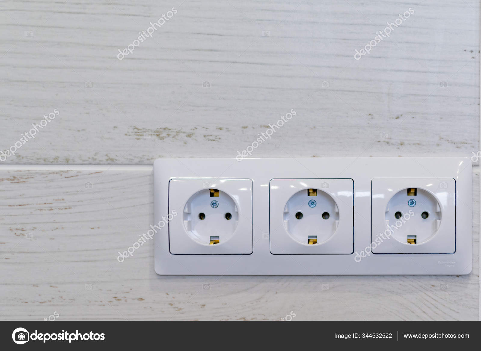 Socket on the wall in the new apartment — Stock Photo © uesiba49 #344532522