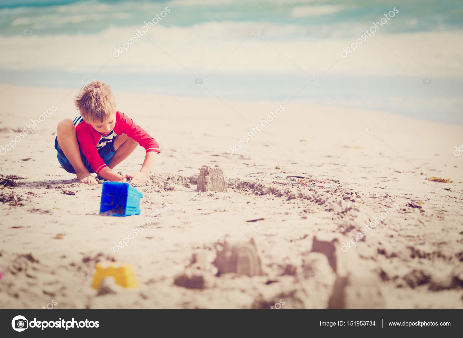 Little boy play with sand on summer beach — Stock Photo © Nadezhda1906 ...