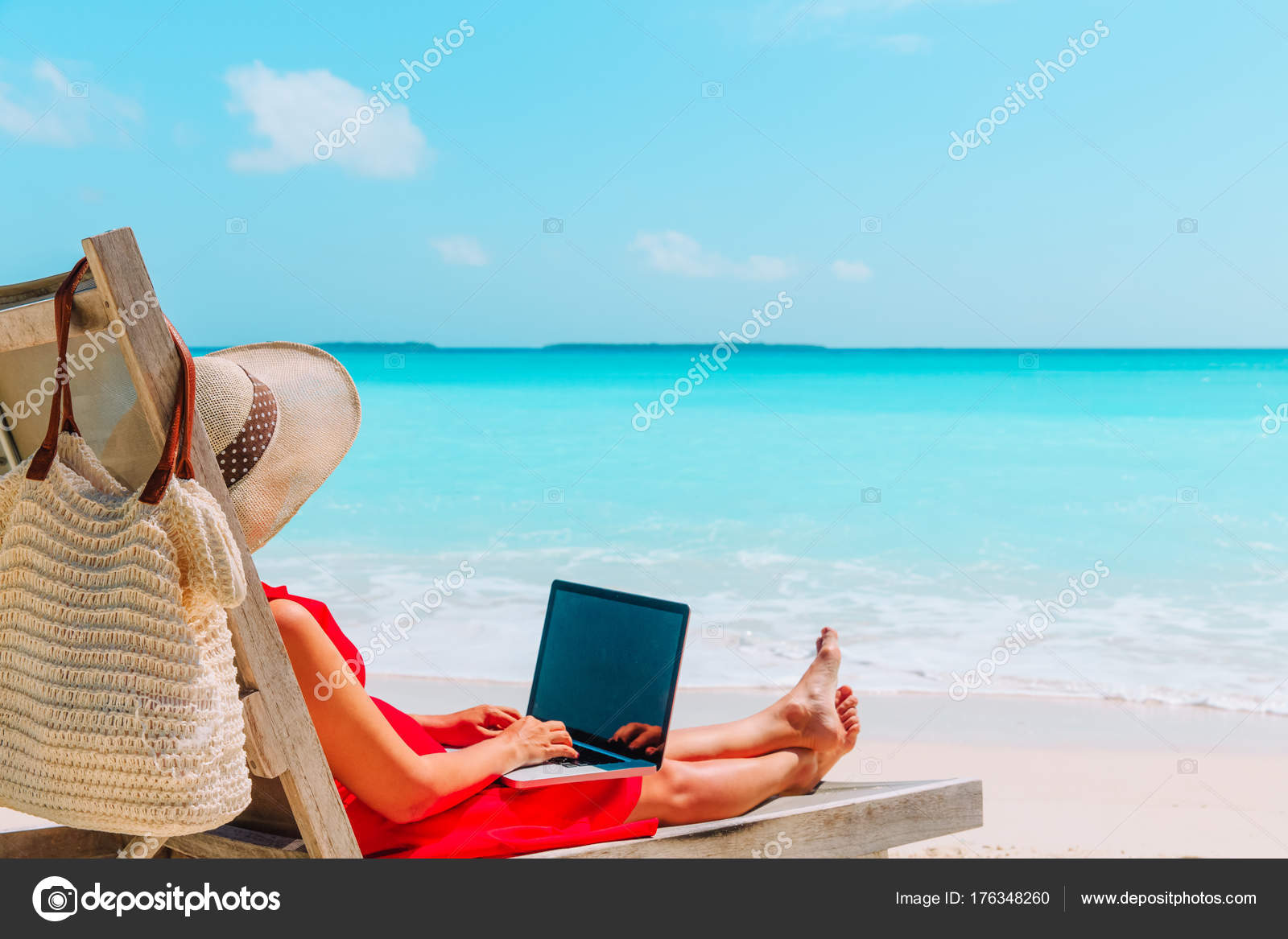Remote work concept -young woman with laptop on beach — Stock Photo ...