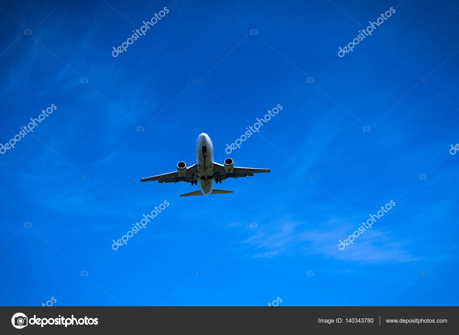 Jet airplane flying overhead close-up — Stock Photo © tiden #140343780