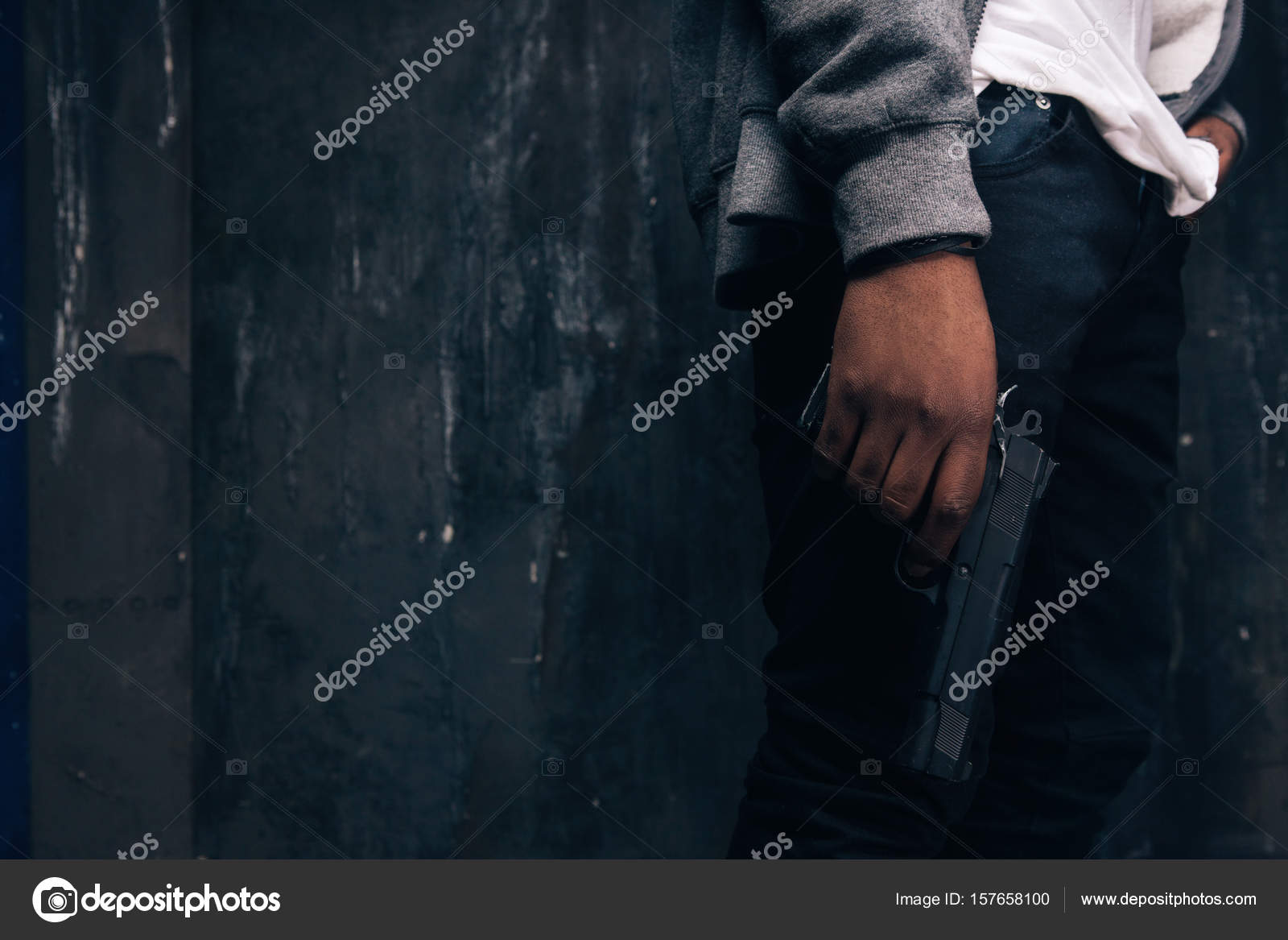 Unrecognizable armed black rapist closeup — Stock Photo © golubovystock ...