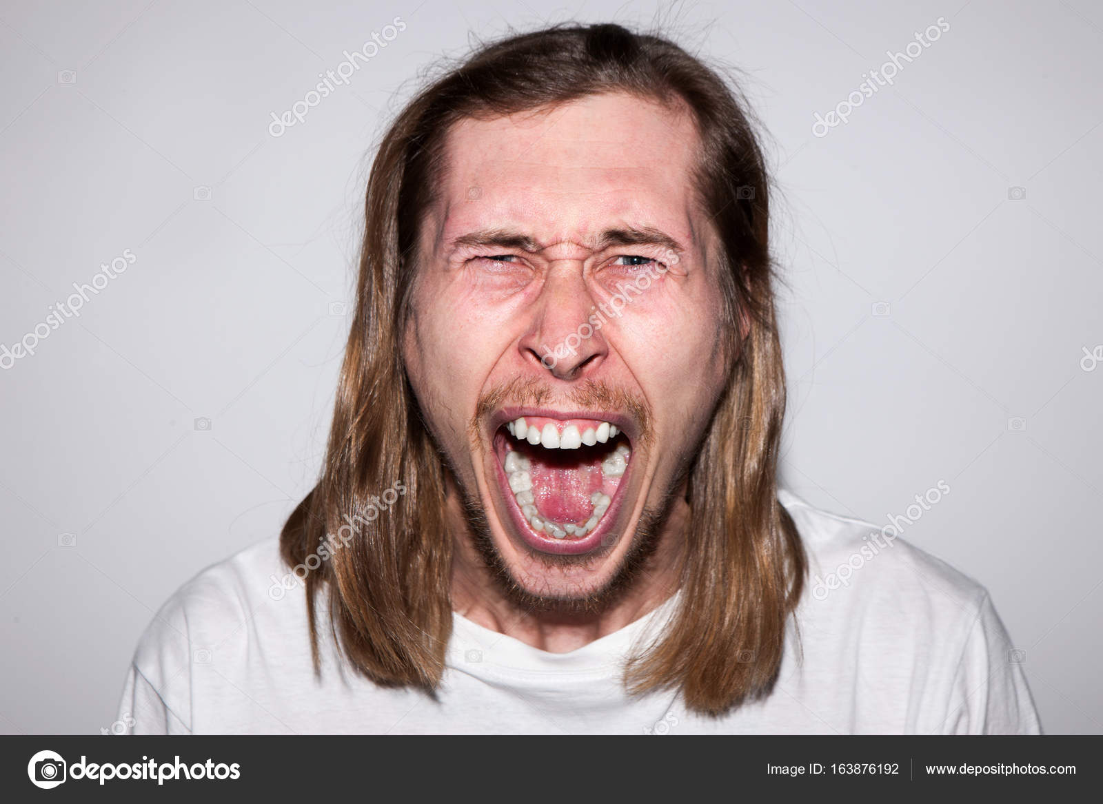 Angry screaming man. Rage emotion — Stock Photo © golubovystock #163876192