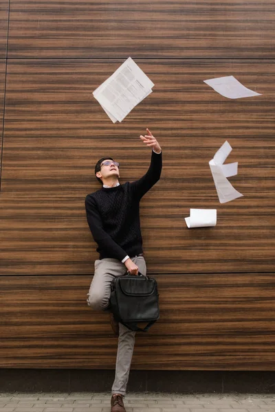 freedom carefree business man papers air no work - Stock Image - Everypixel