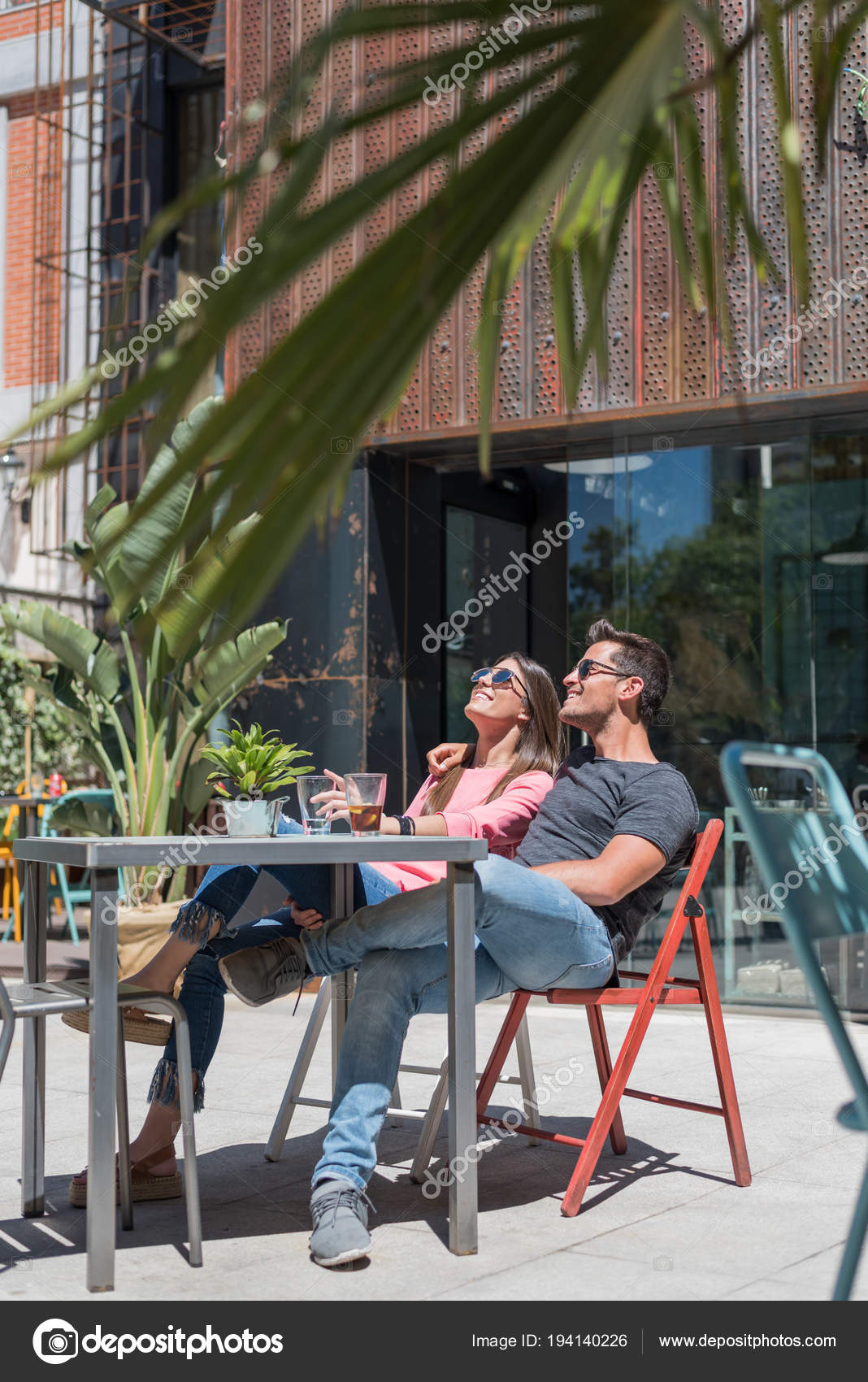 Happy Young Couple Seating Relaxed Restaurant Terrace Stock Photo by ...
