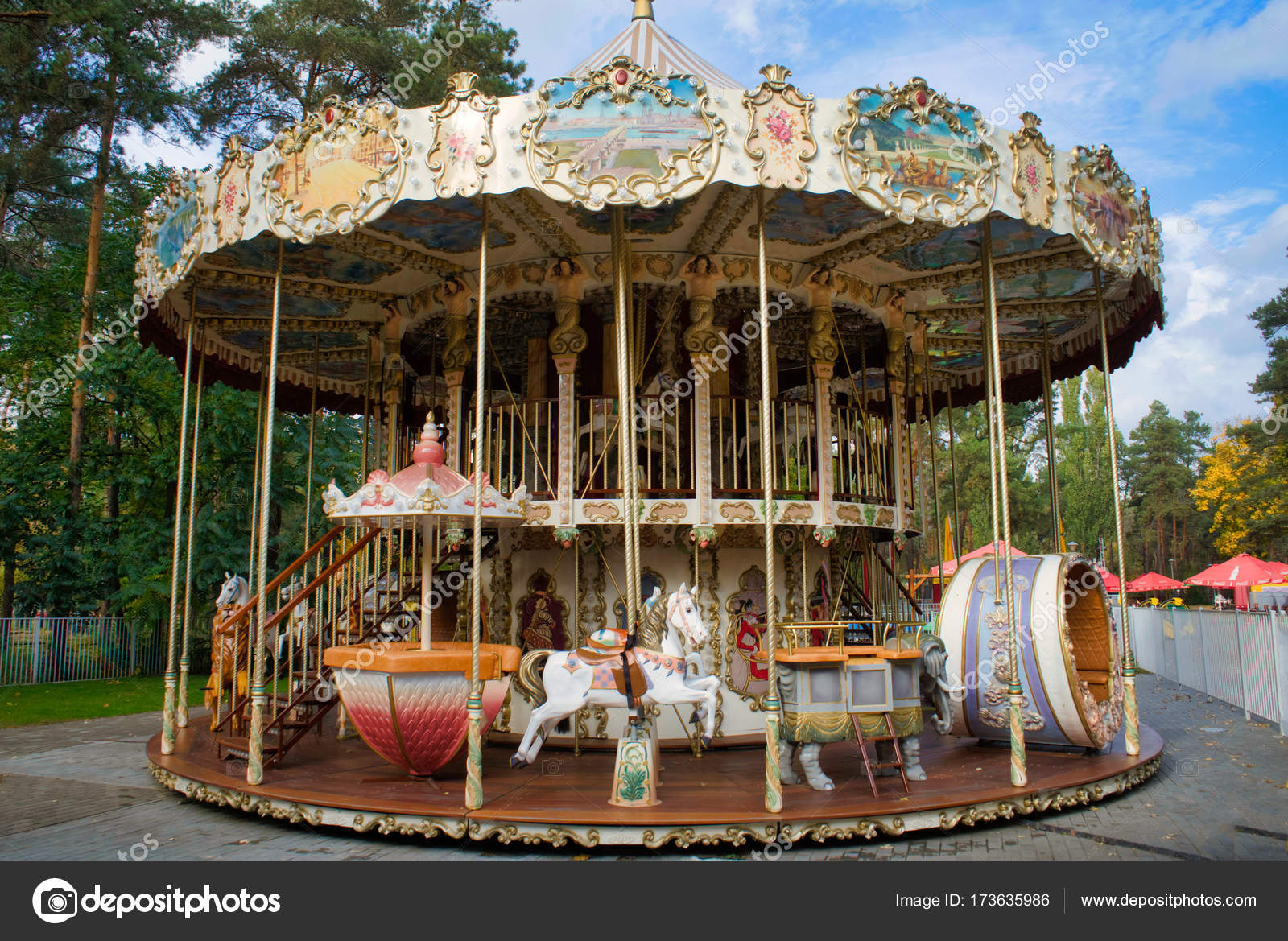 Old vintage carousel attraction in the park Stock Photo by ...