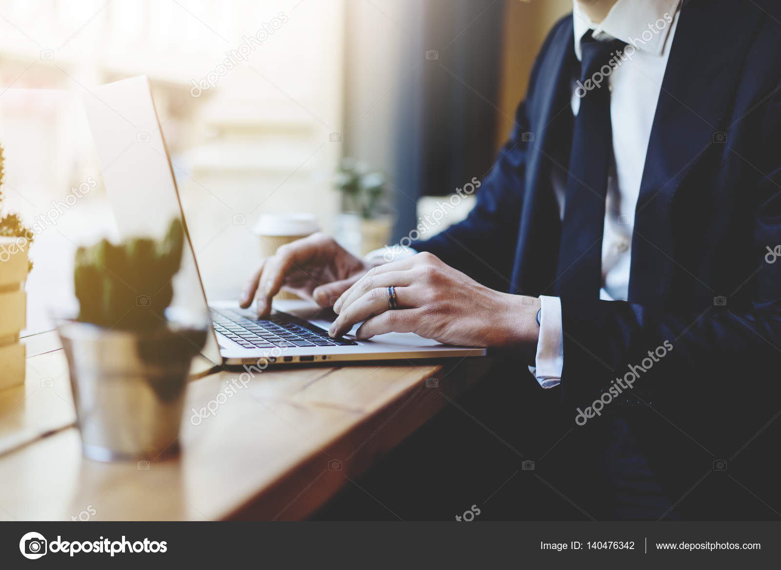 Businessman using modern laptop Stock Photo by ©Im_Yanis 140476342