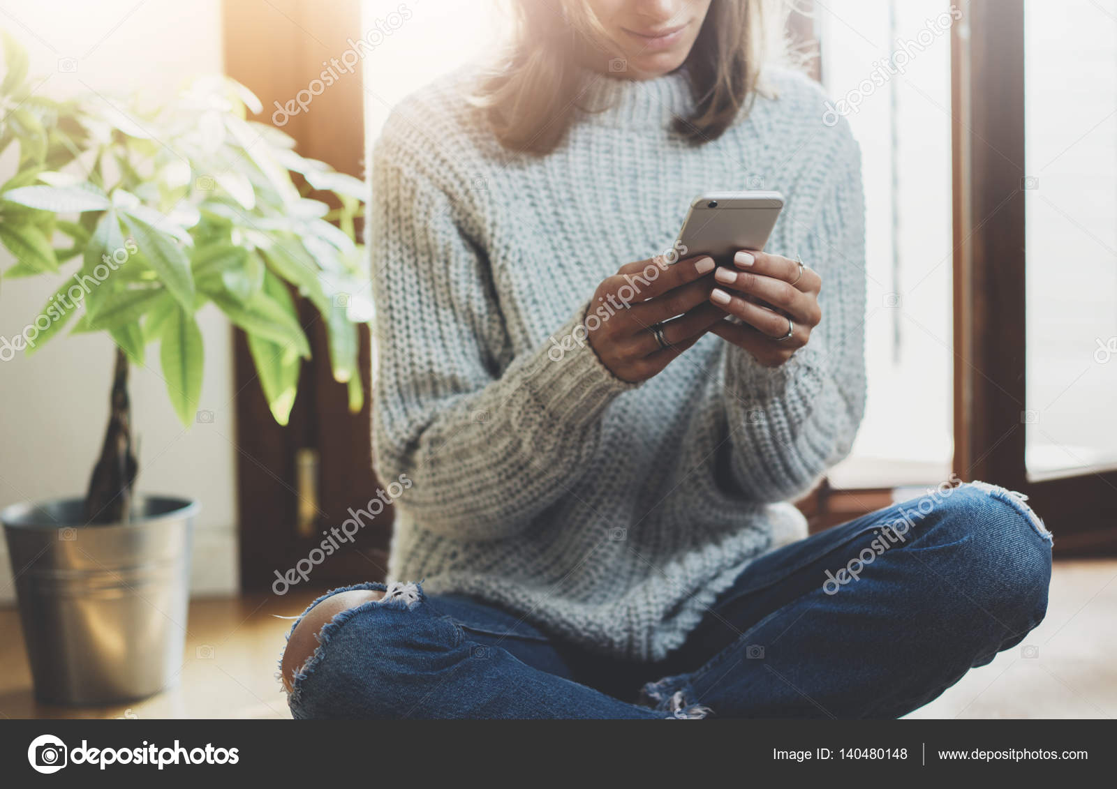 Woman using modern smartphone — Stock Photo © Im_Yanis #140480148 Woman using modern smartphone — Stock Photo © Im_Yanis #140480148