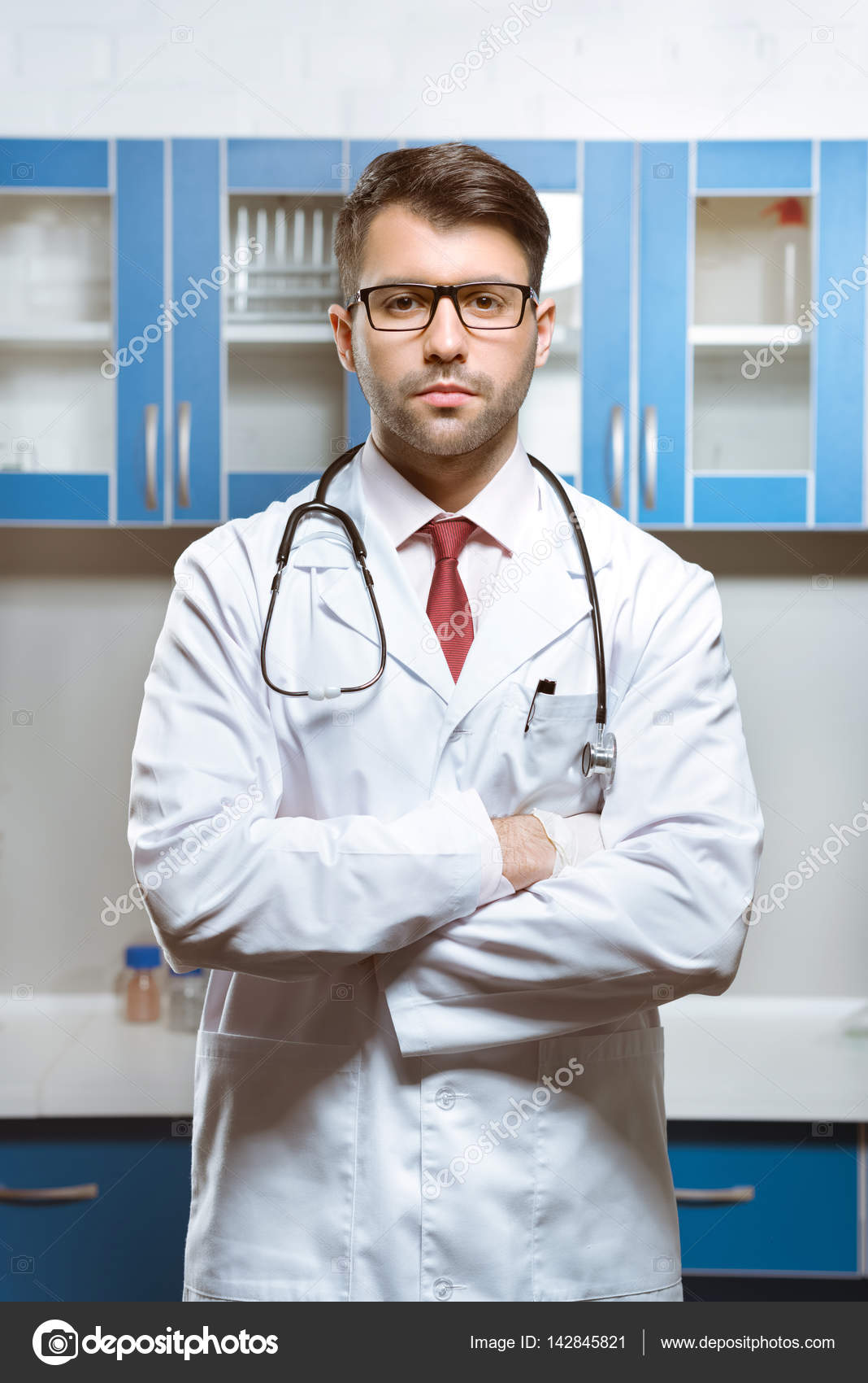 Doctor in medical uniform Stock Photo by ©SergIllin 142845821 Doctor in medical uniform Stock Photo by ©SergIllin 142845821