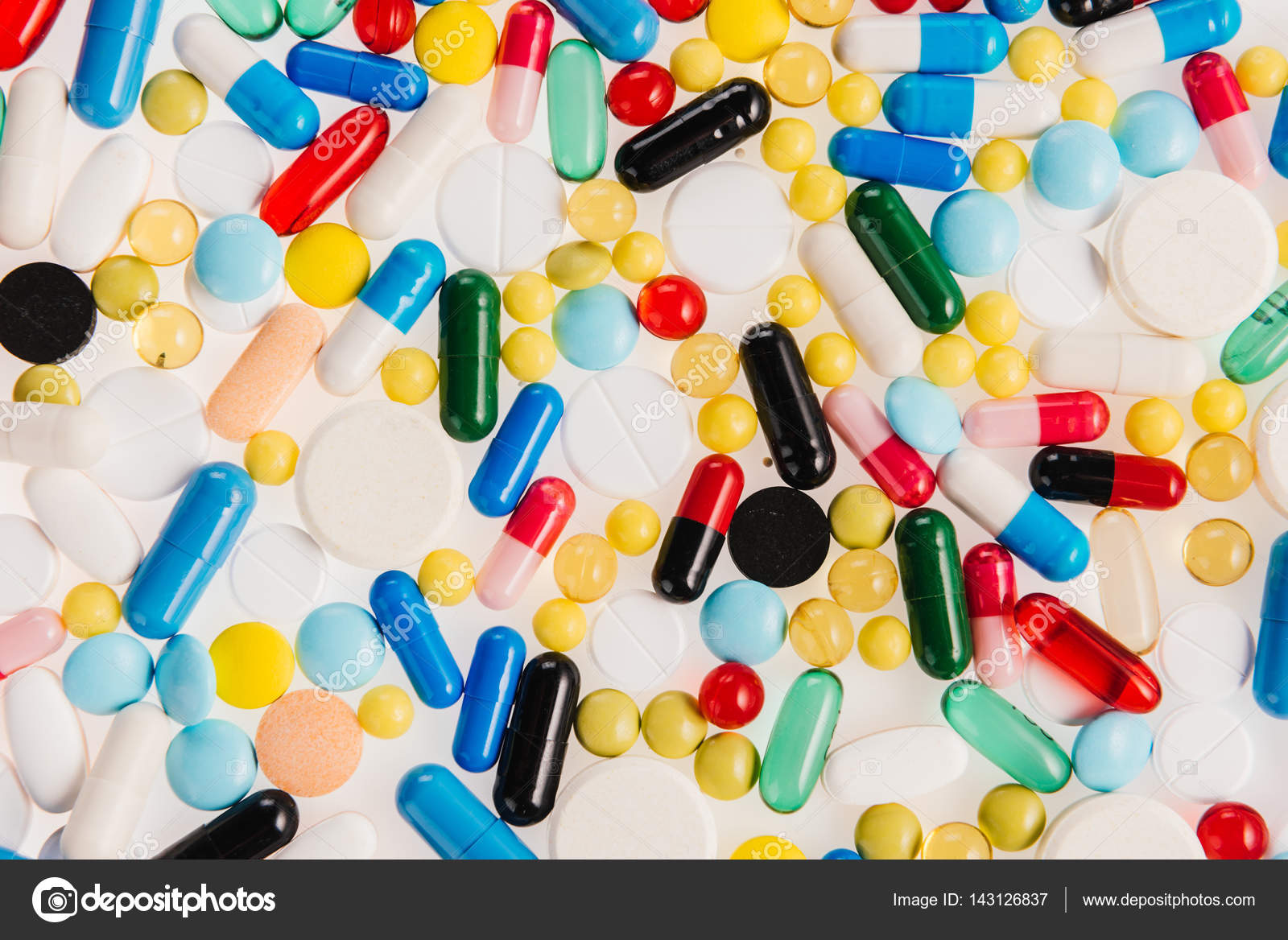 Pile of colorful pills — Stock Photo © SergIllin #143126837