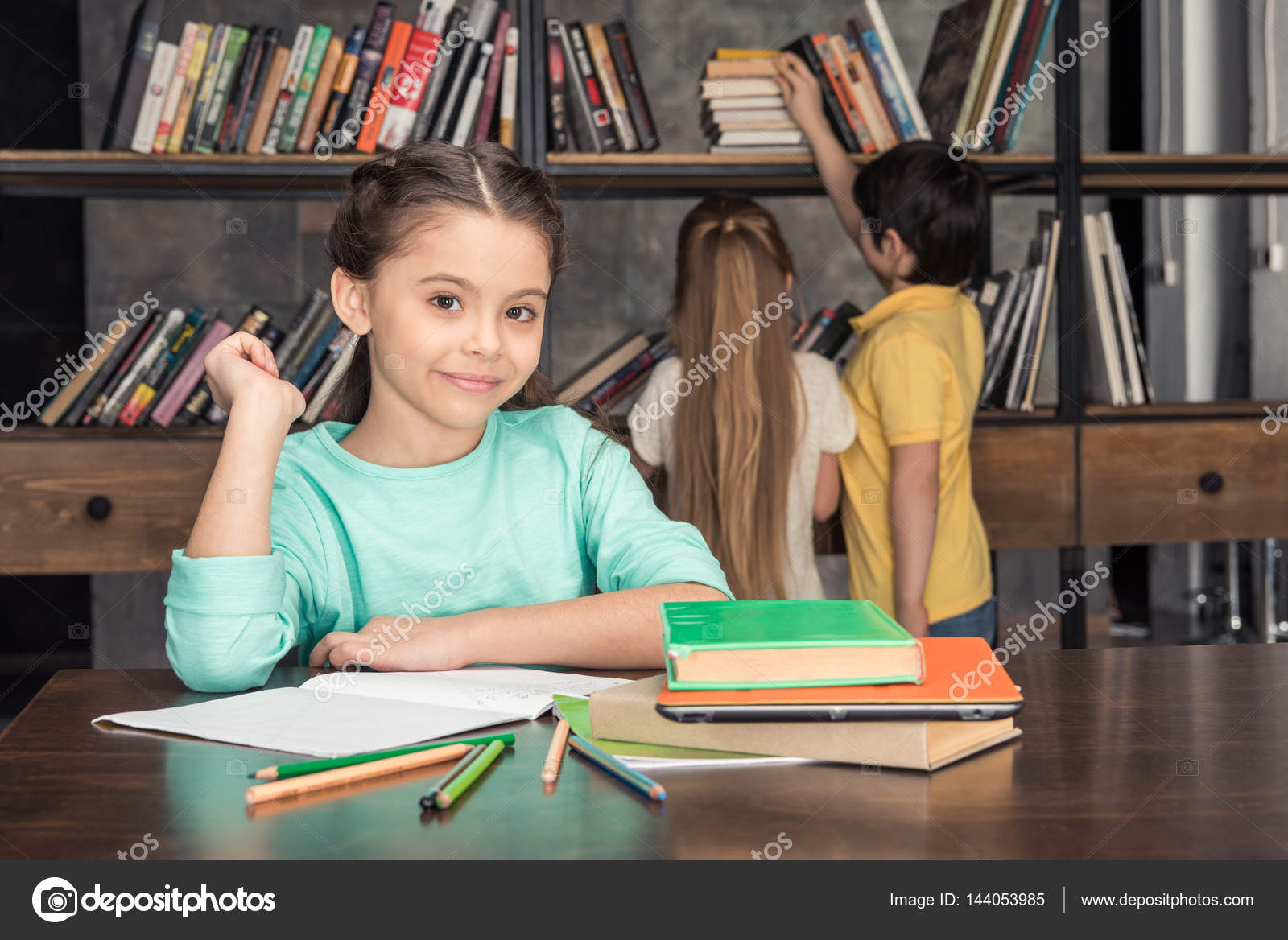 Girl doing homework — Stock Photo © ZaraMuzafarova #144053985