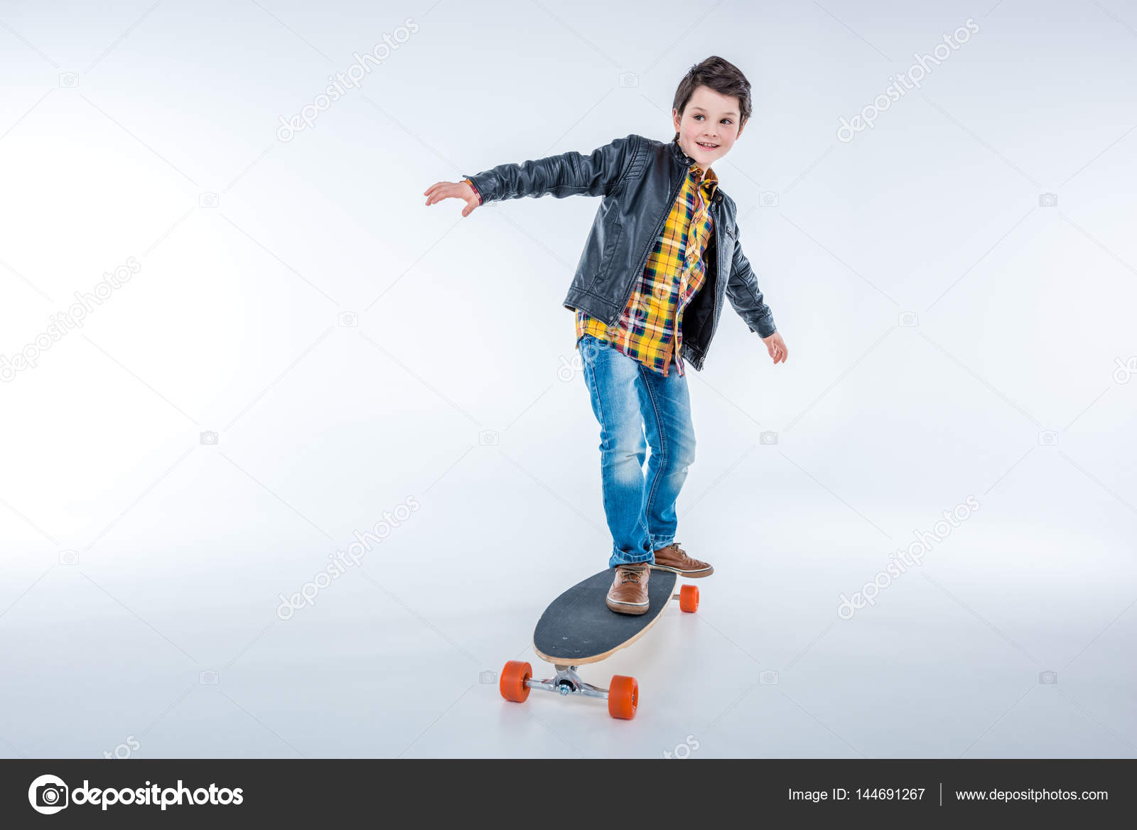 Boy riding skateboard — Stock Photo © ZaraMuzafarova #144691267