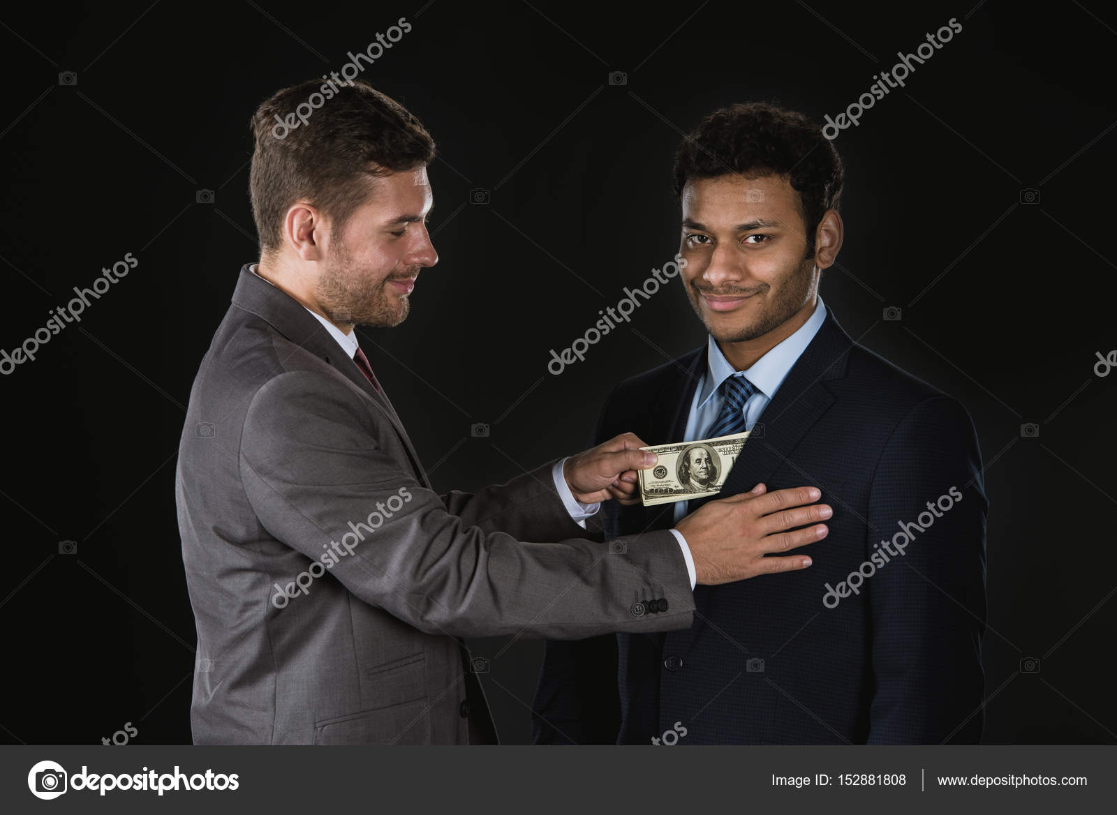 Businessman bribing partner — Stock Photo © SergPoznanskiy #152881808