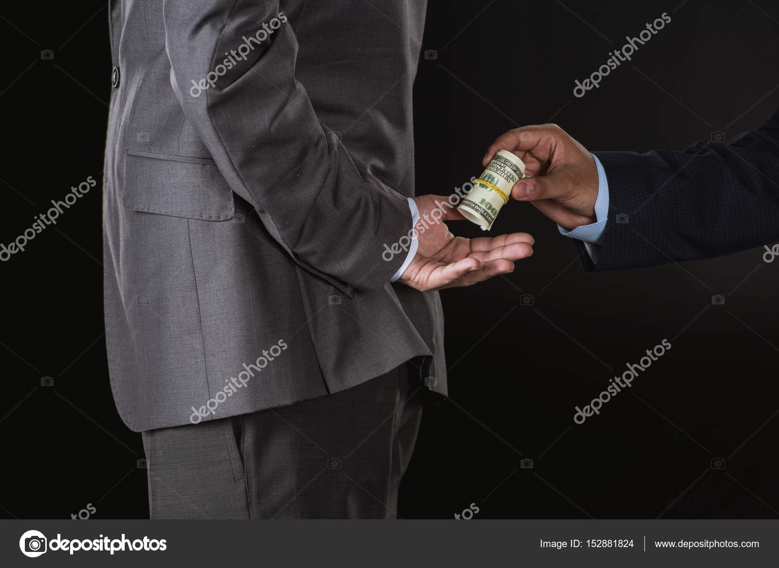 Businessman bribing partner — Stock Photo © SergPoznanskiy #152881824