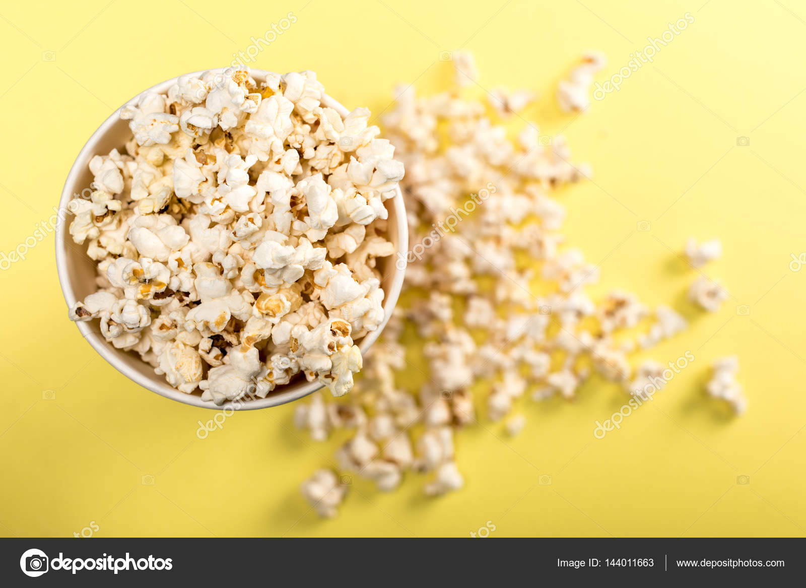Popcorn in paper cup — Stock Photo © K.Klimenko #144011663