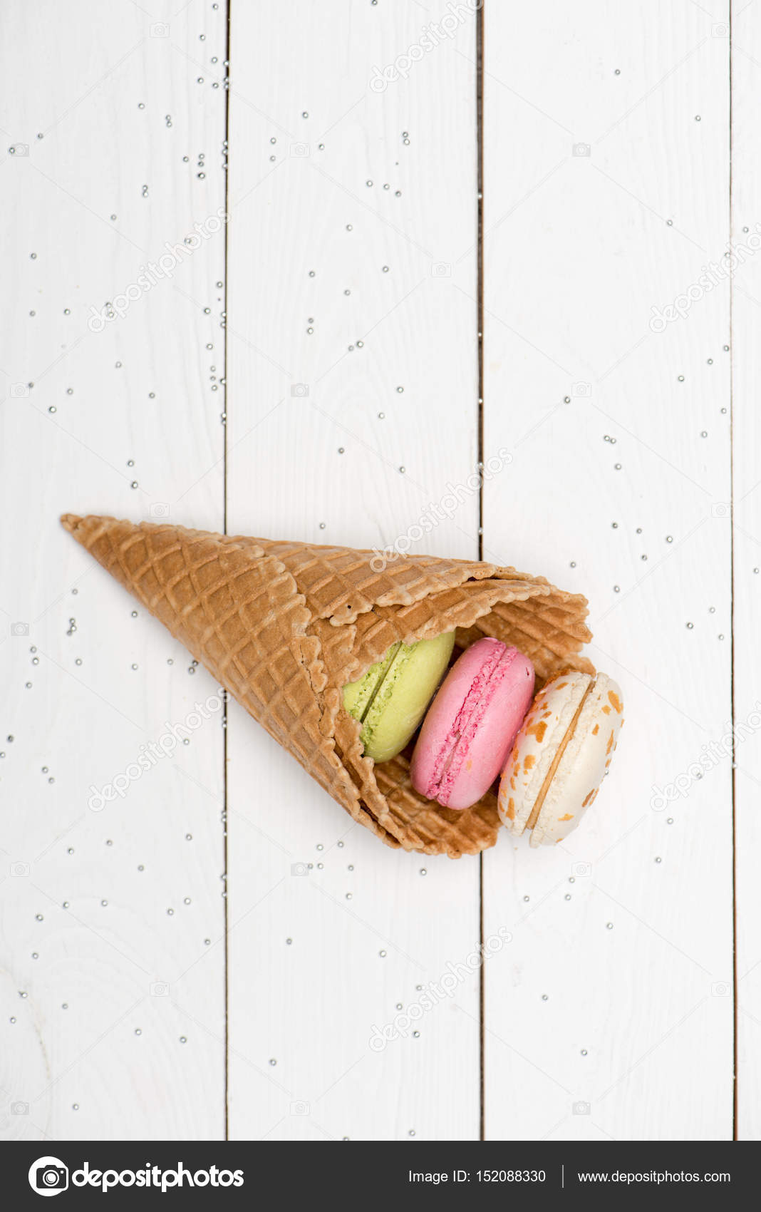 Colorful macarons in waffle cones Stock Photo by ©K.Klimenko 152088330