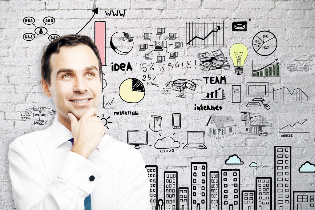 Handsome businessperson with creative business sketch. Success concept ...