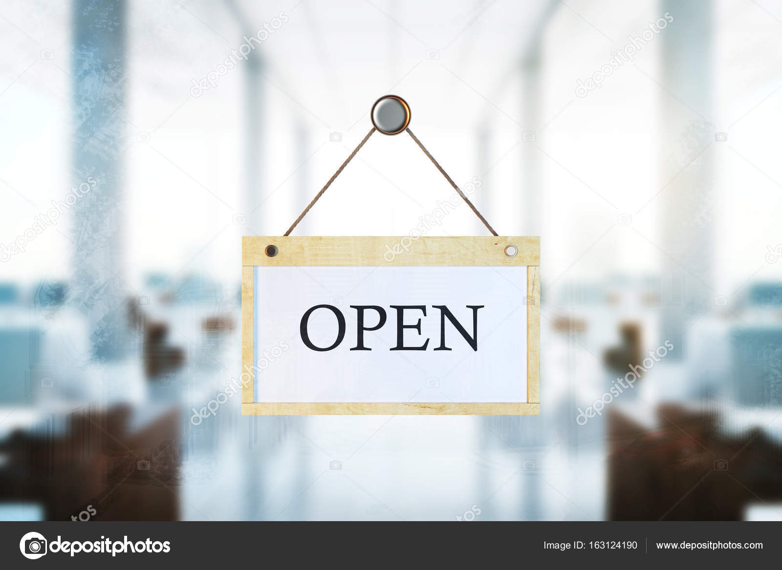 Open sign on blurry office background Stock Photo by ©peshkova 163124190