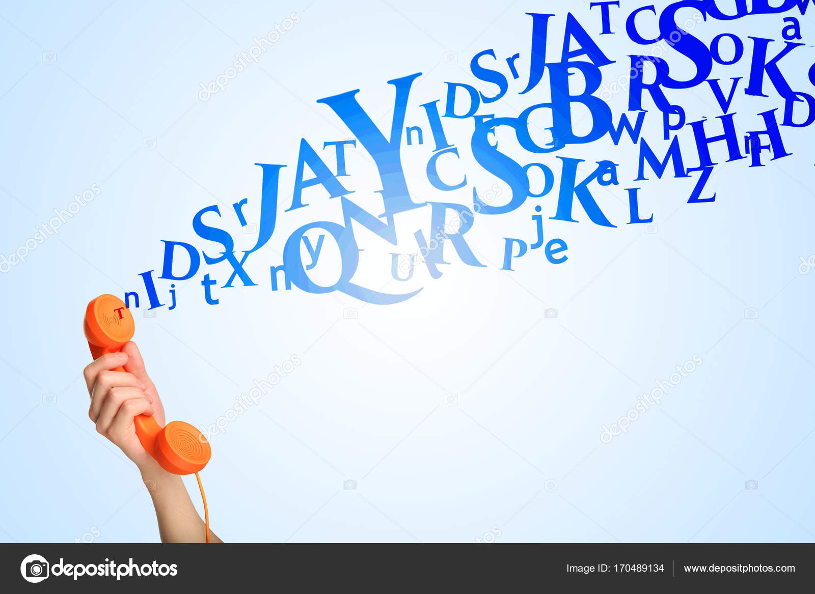 Hand holding telephone with letters on light background. Communication ...