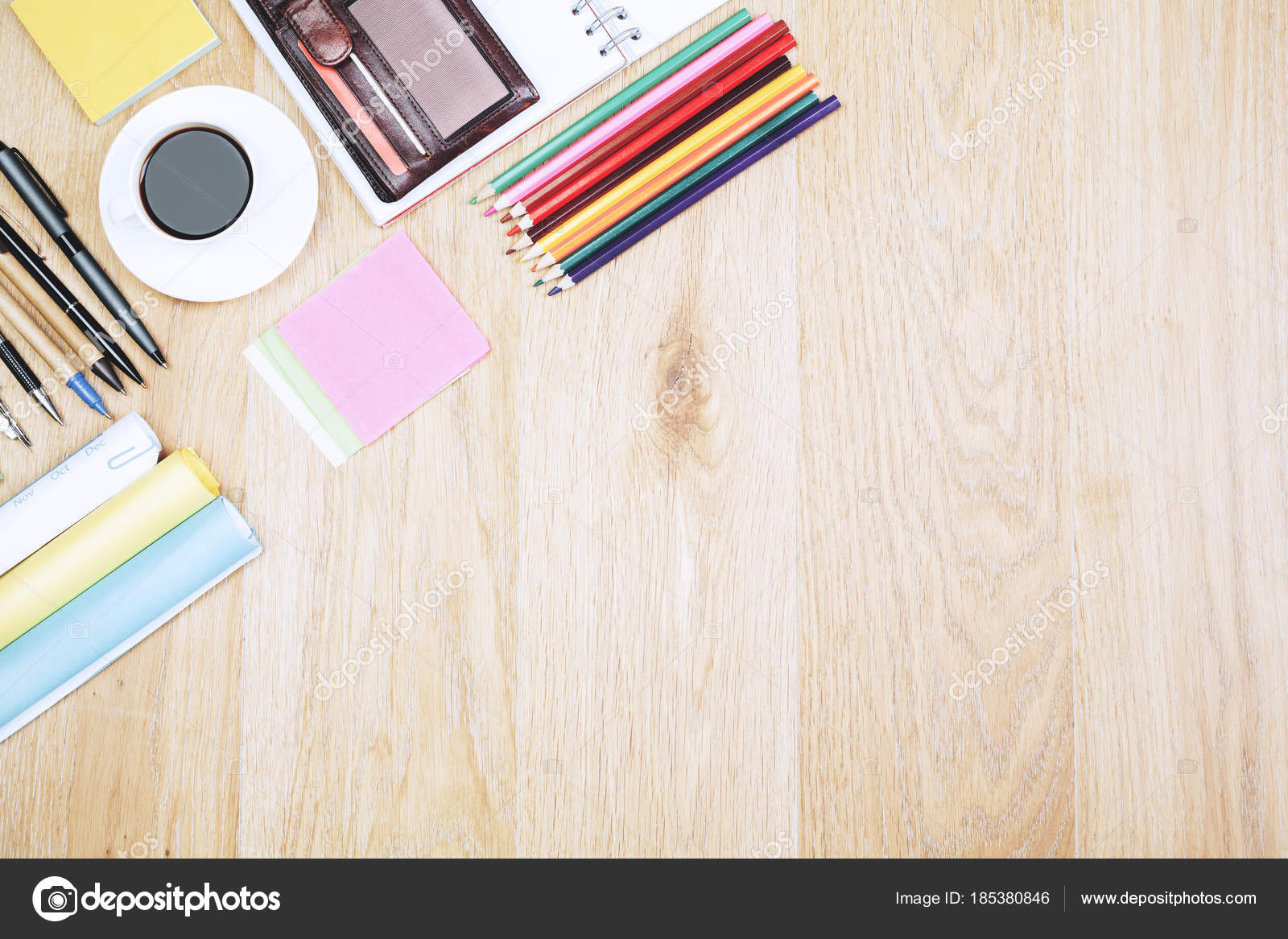 Contemporary office desk with items Stock Photo by ©peshkova 185380846