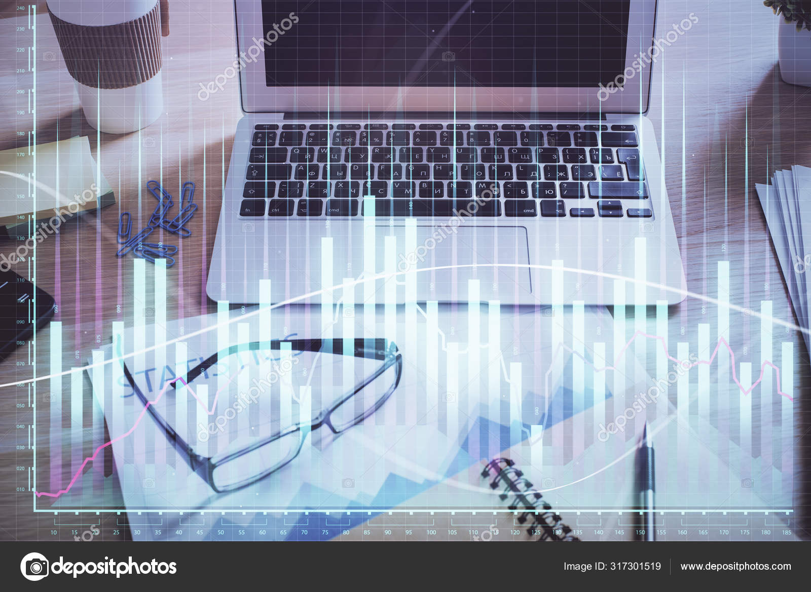 Financial chart drawing and table with computer on background. Multi ...