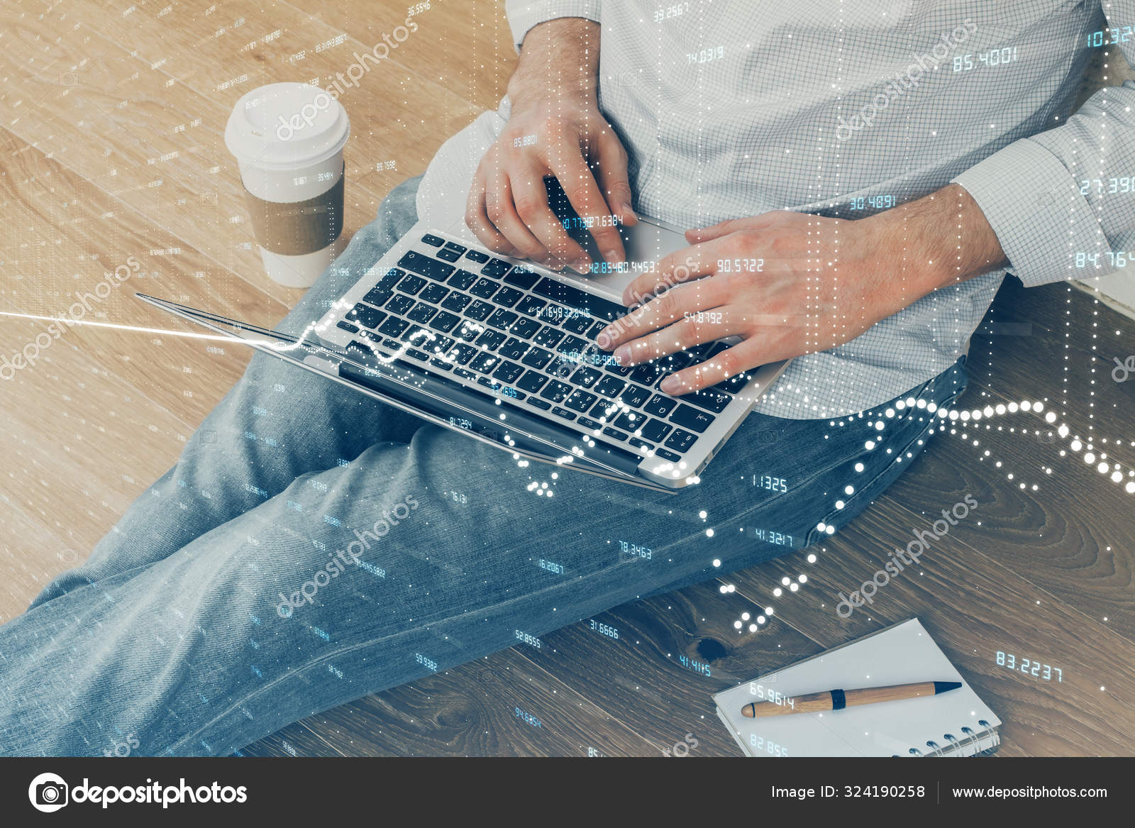 Forex graph with businessman working on computer in office on ...