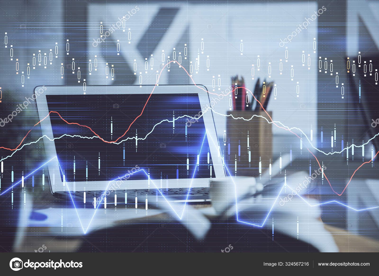 Financial chart drawing and table with computer on background. Multi ...