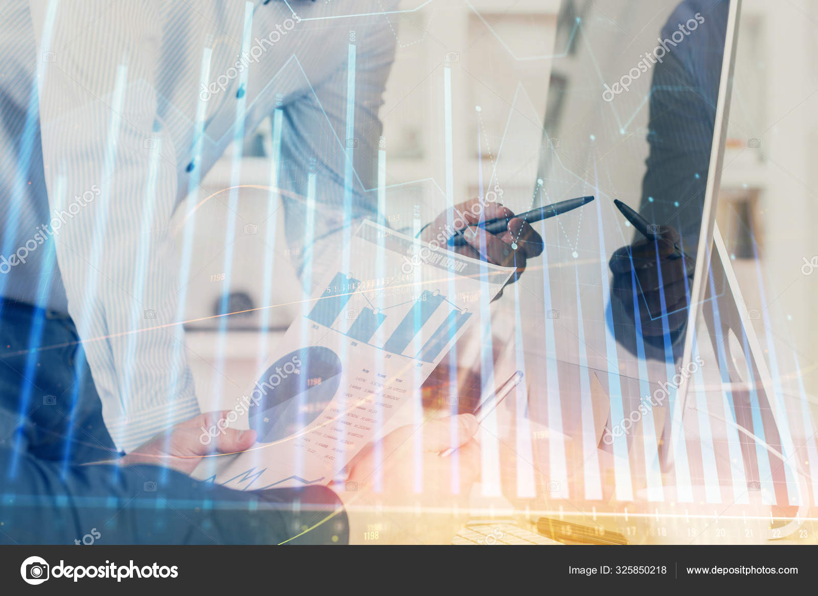 Double exposure of chart with businessman typing on computer in office ...