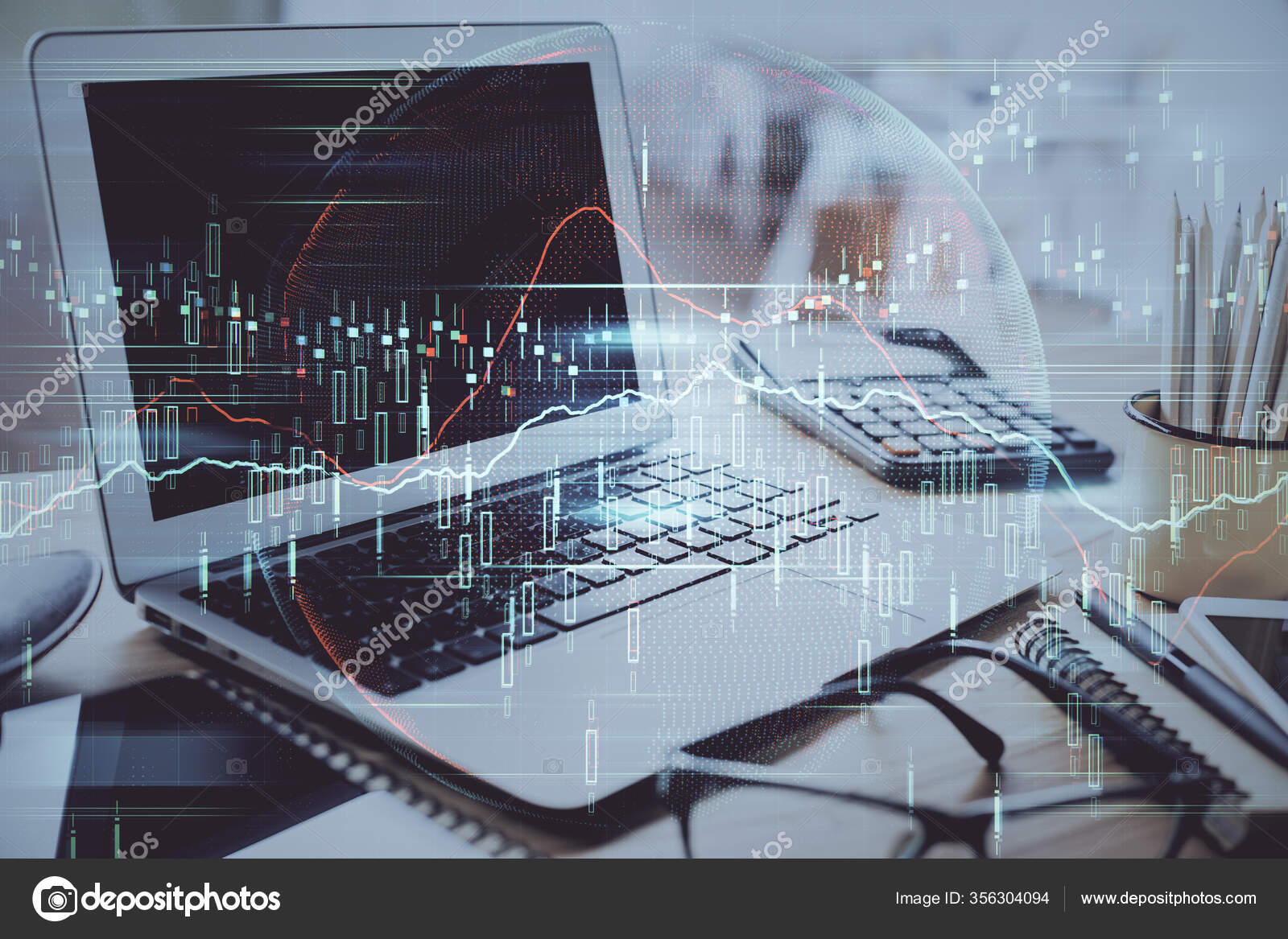 Financial chart drawing and table with computer on background. Multi ...