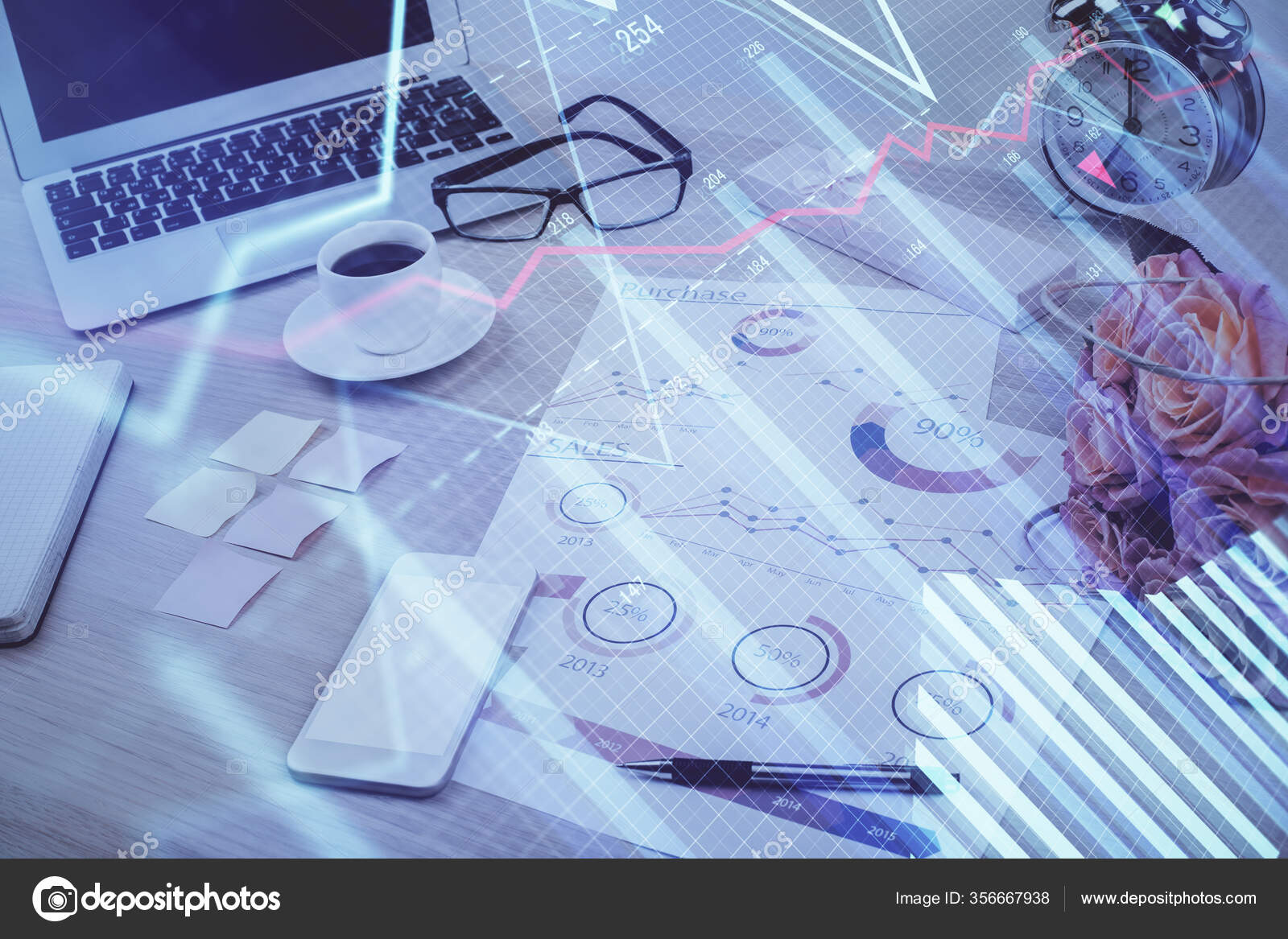 Financial chart drawing and table with computer on background. Double ...