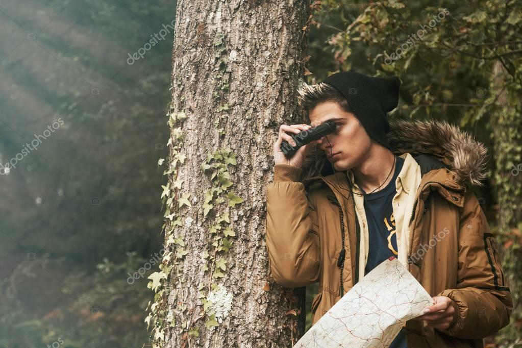 Travelers, man sith map Stock Photo by ©carballo 128841092