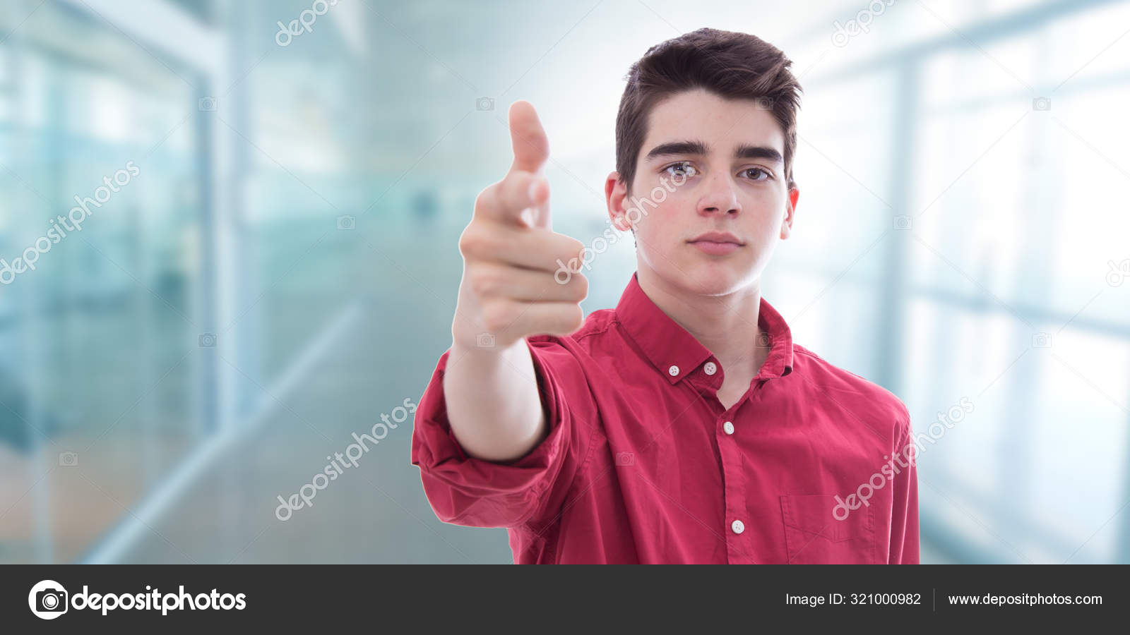 Young Teenage Man Pointing Forward — Stock Photo © carballo #321000982