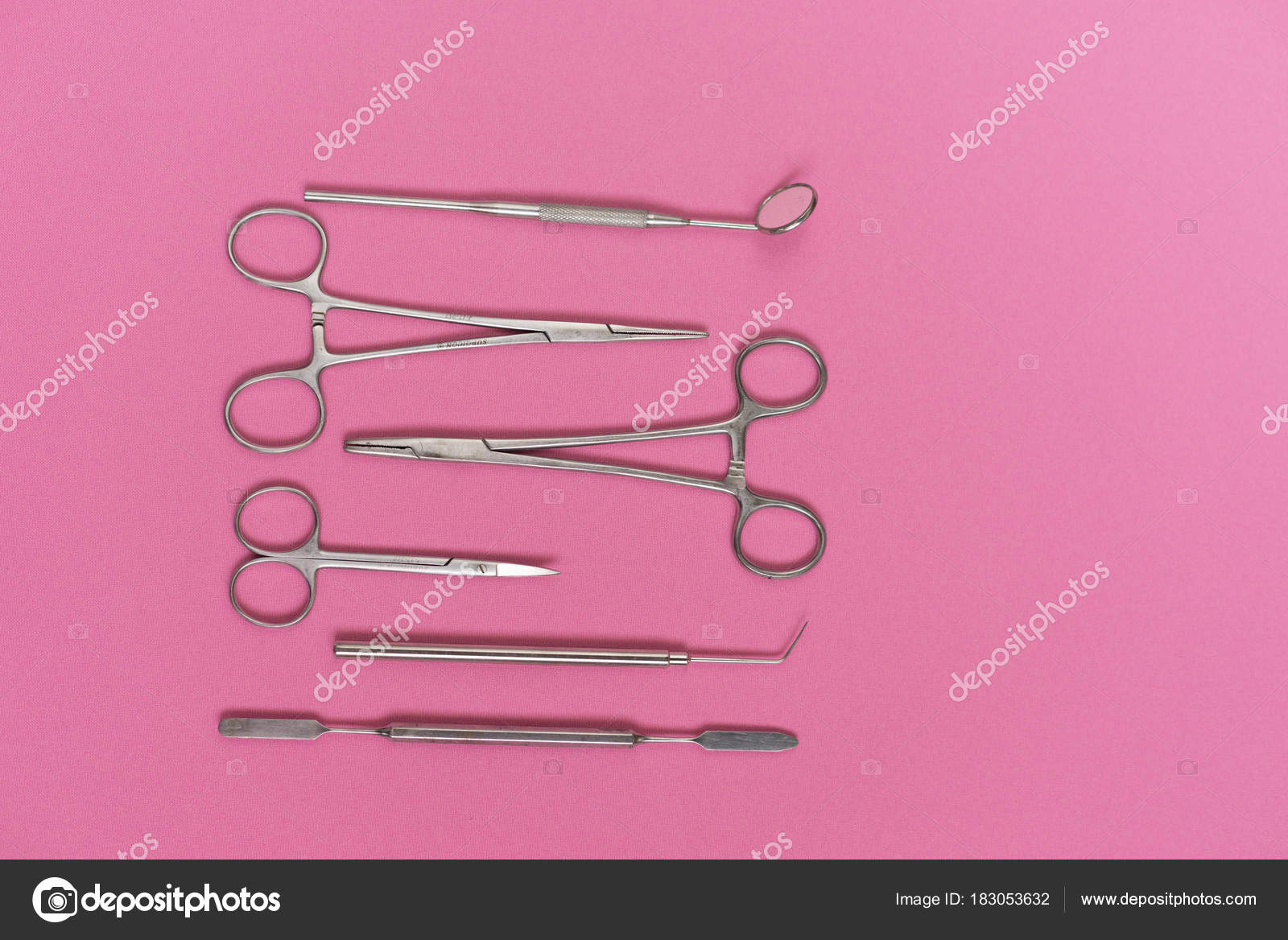 On a pink background is a dental instrument — Stock Photo © mne_len ...