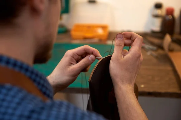 Man sewing Stock Photos, Royalty Free Man sewing Images | Depositphotos