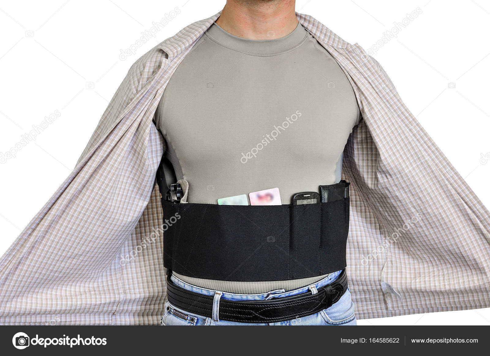 Torso of a man dressed in civilian clothes, underneath the shirt Stock ...