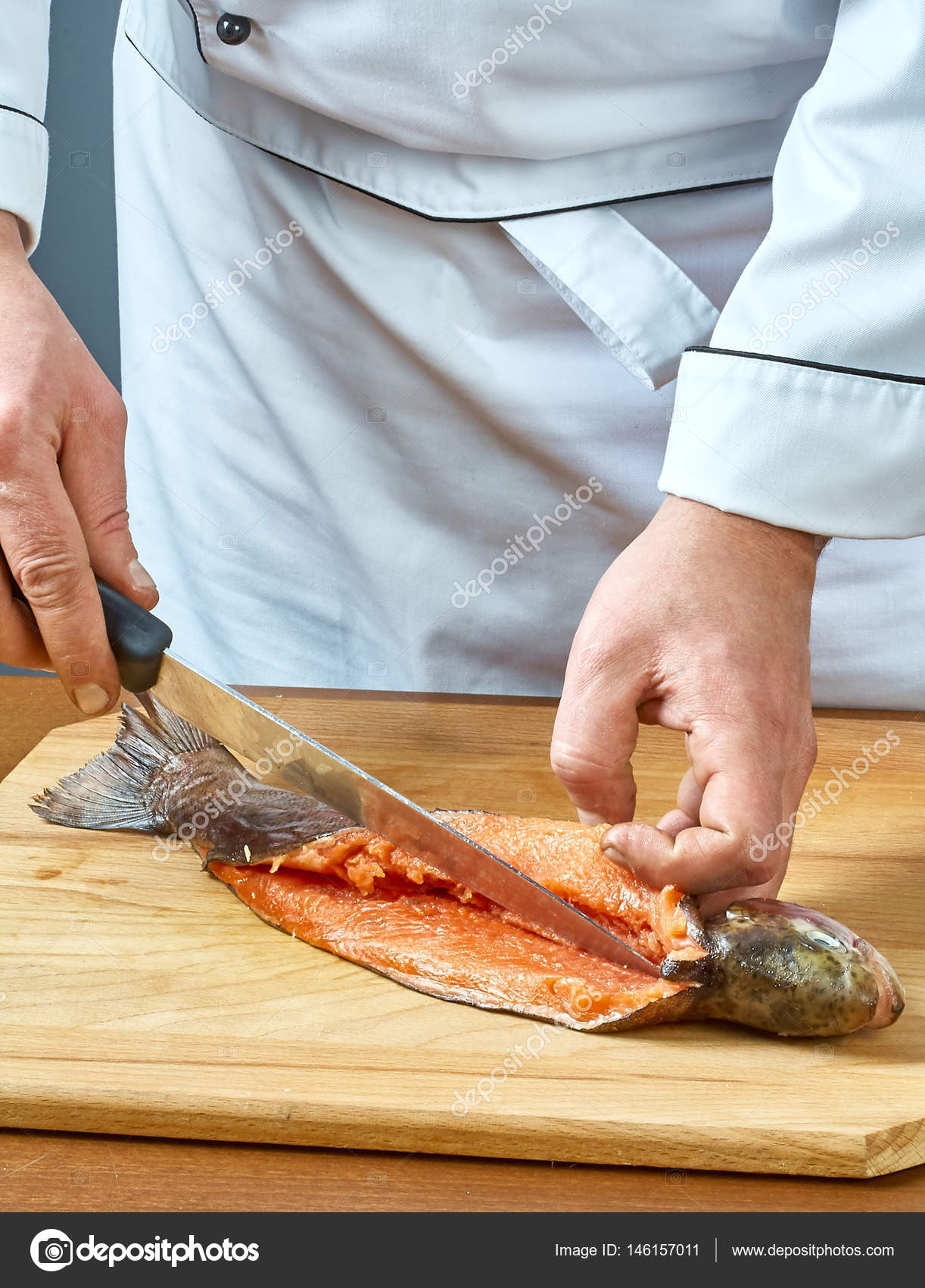 Cook cuts fish full collection of food recipes — Stock Photo ...