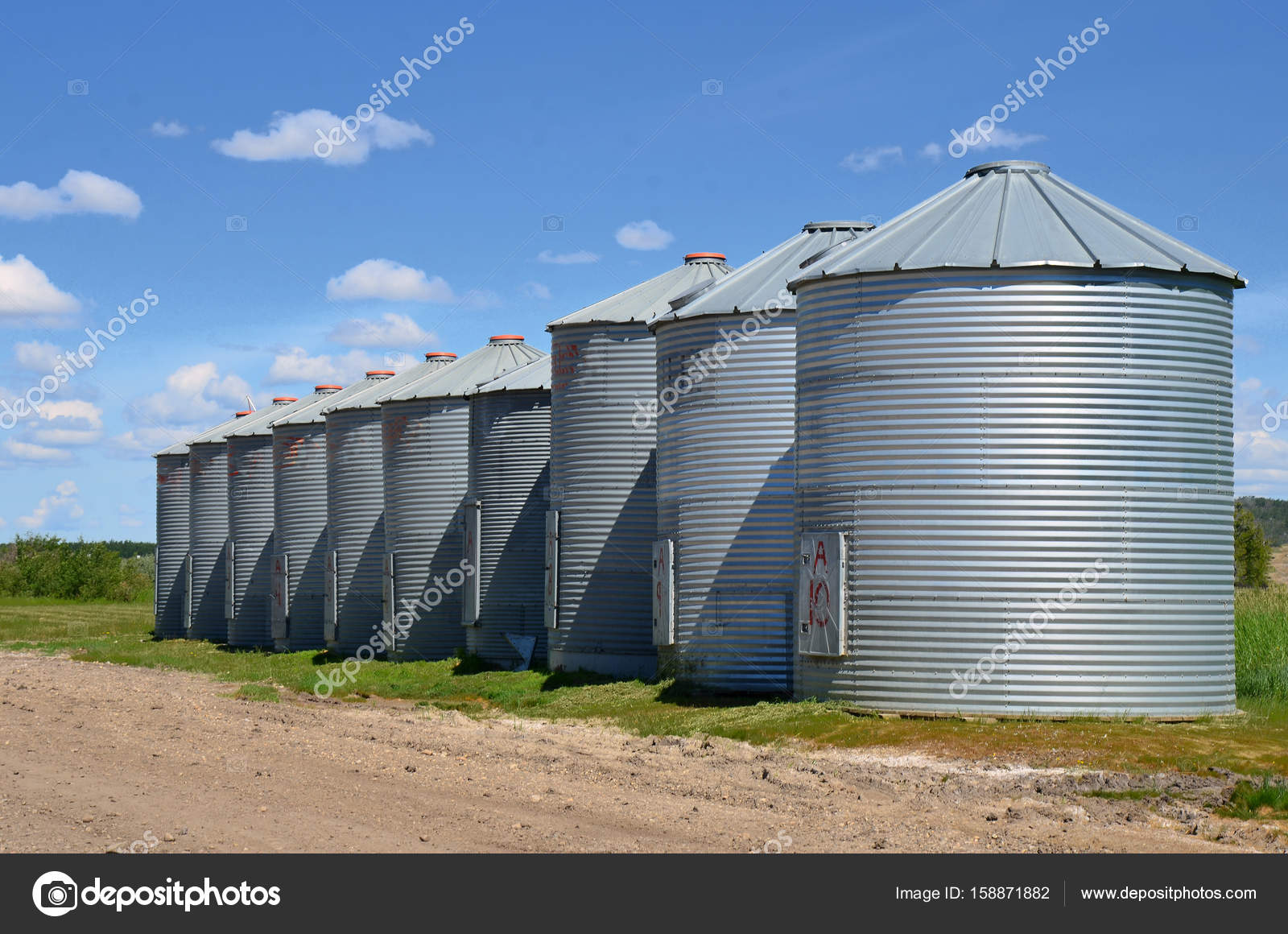 Large Steel Grain Storage Bins Stock Photo by ©shutterbug68 158871882