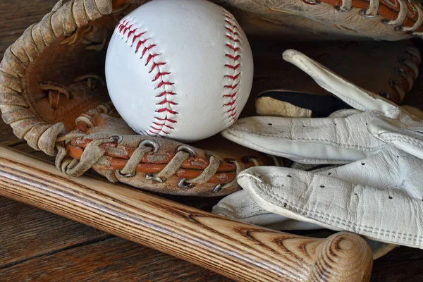 A close up image of old used baseball equipment. - Stock Image - Everypixel