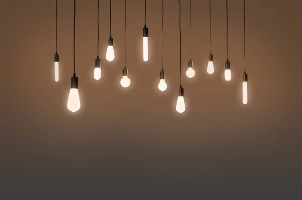 bulbs electric and a light as a concept background color brown - Stock ...