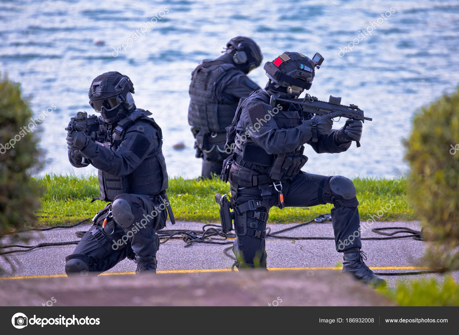 Special forces tactical team of three in action — Stock Photo © xbrchx ...