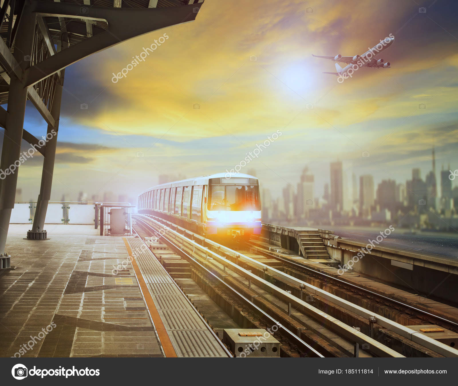 Sky trains mass transportation station and plane flying over cit Stock ...